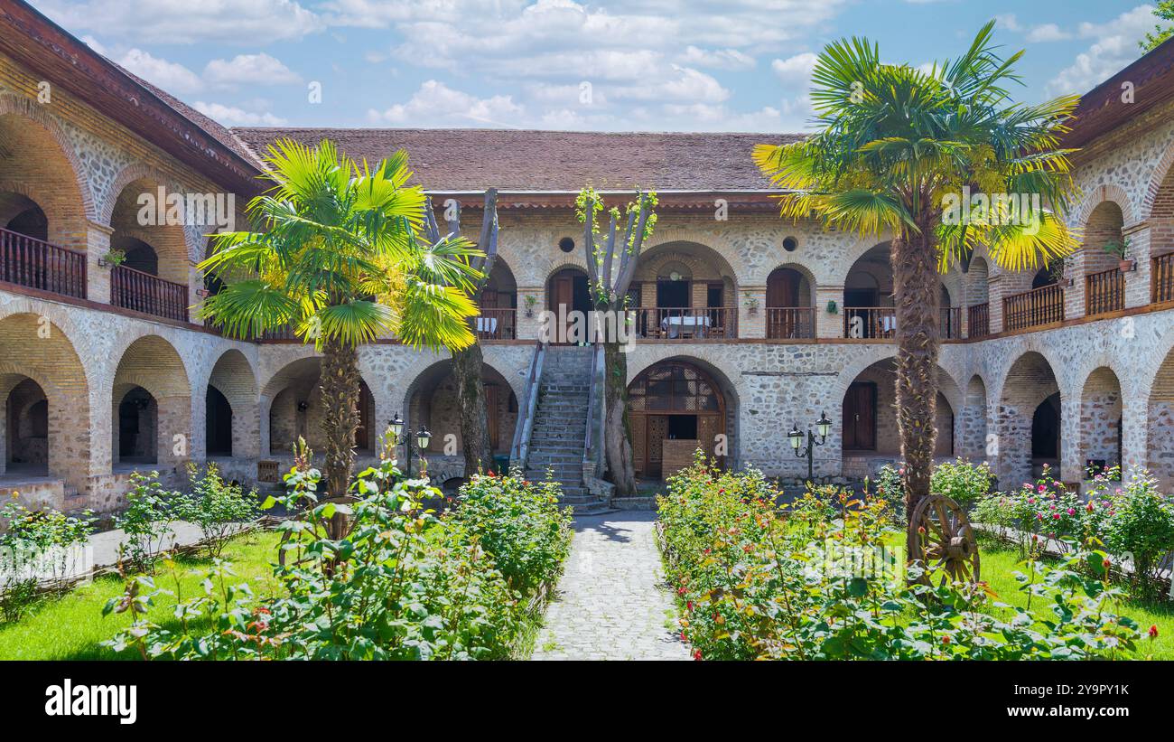 The courtyard of the Upper Caravanserai in Shaki, Azerbaijan, features ...