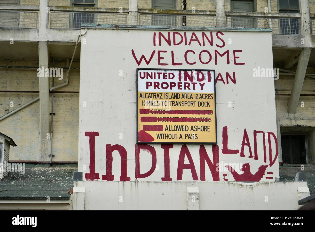Historic Indians Welcome banner at Alcatraz Prison Stock Photo - Alamy