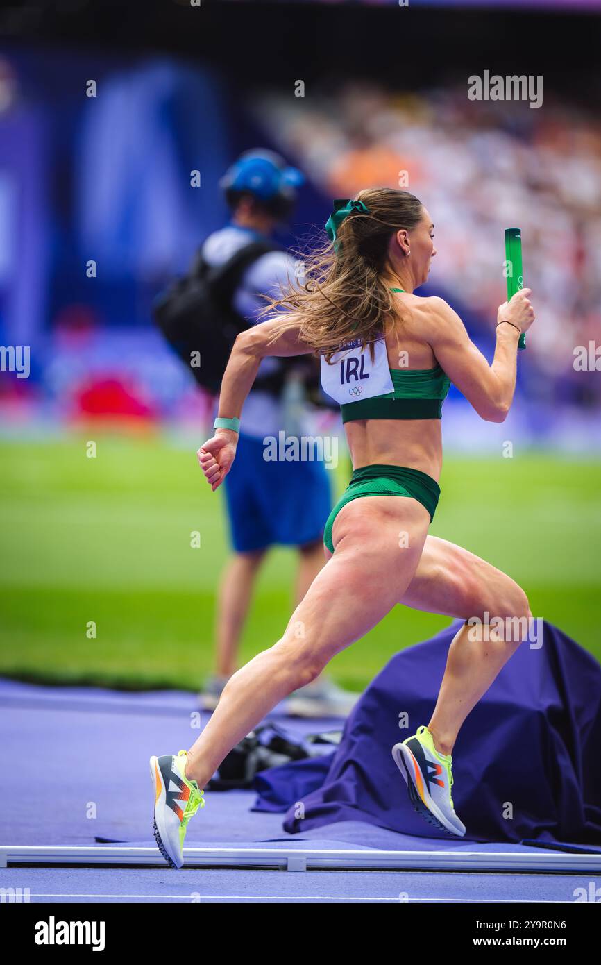 Kelly McGrory participating in the 4X400 meters relay at the Paris 2024 ...