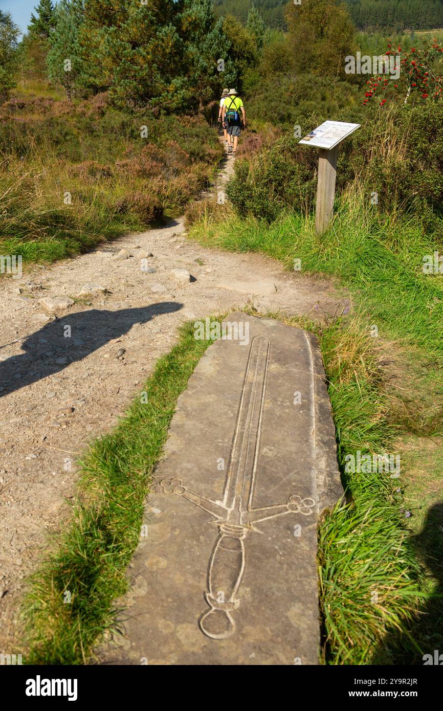 Carved sword on a wayside marker on the West Highland way at the site ...