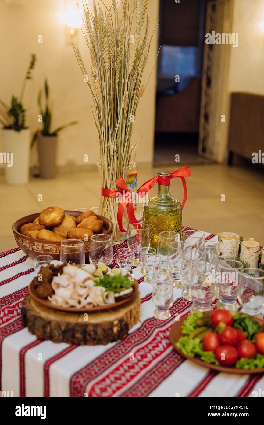 Traditional Ukrainian cuisine with lard, bread, vegetables, and meat on ...