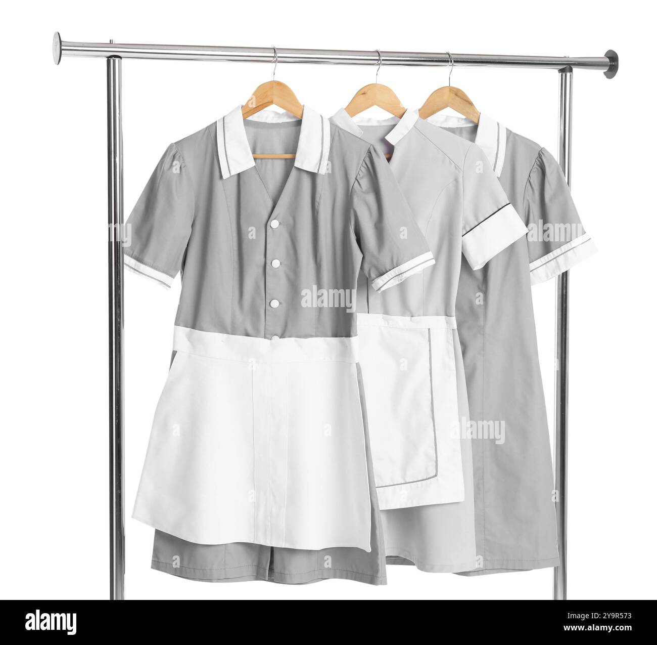 Maids' uniforms on clothing rack isolated on white Stock Photo - Alamy