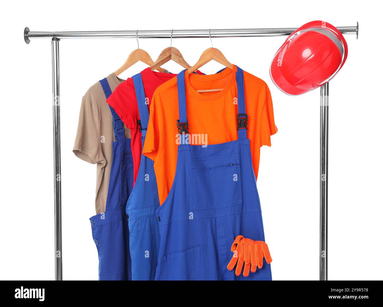 Workers' uniforms on clothing rack isolated on white Stock Photo - Alamy