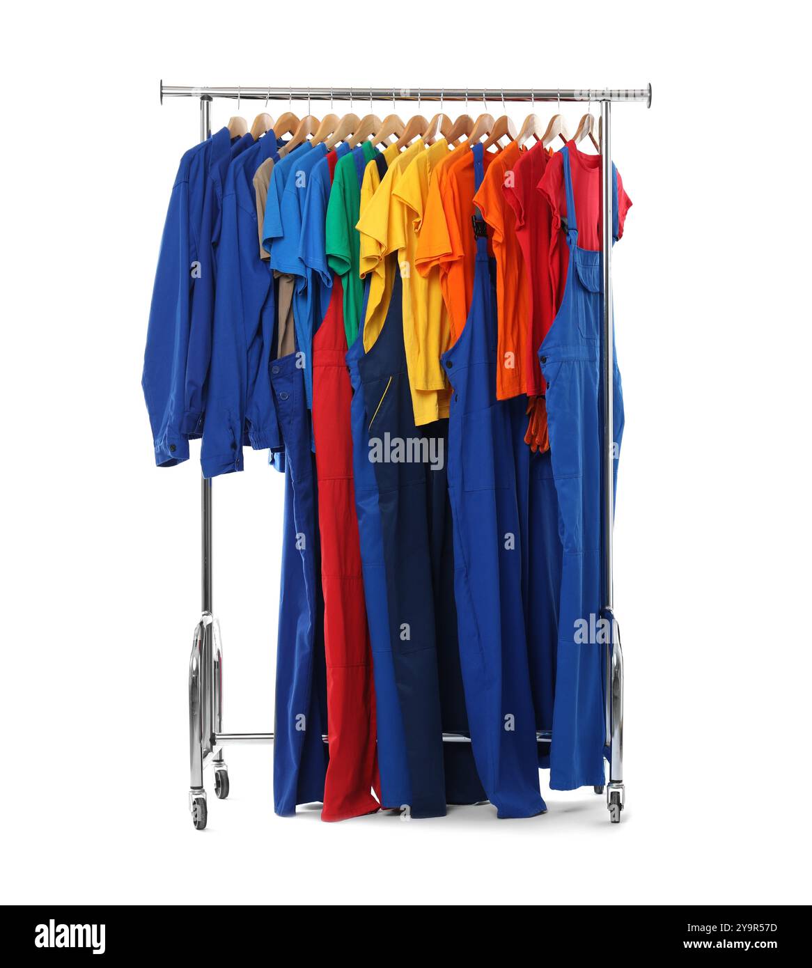 Different workers' uniforms on clothing rack isolated on white Stock ...
