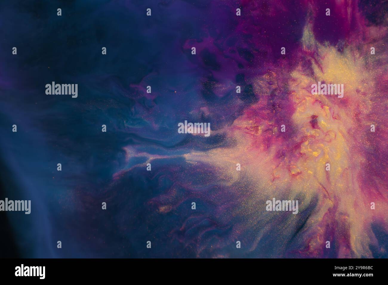 Electric blue and violet clouds paint a galaxy in the sky Stock Photo ...