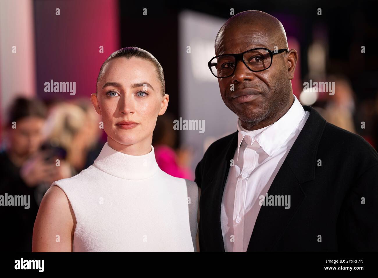 Saoirse Ronan, left, and Steve McQueen pose for photographers upon ...