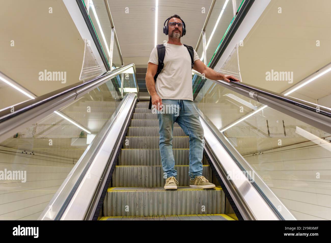 Descent on escalator platform hi-res stock photography and images - Alamy