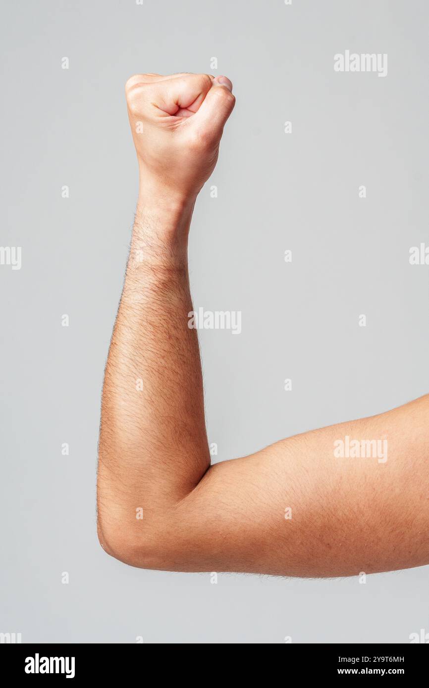 A person hand gesture against a neutral background Stock Photo - Alamy