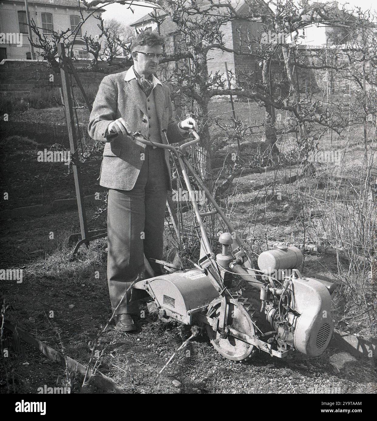 1960s, historical, a gentleman wearing a sports jacket, waistcoat and ...