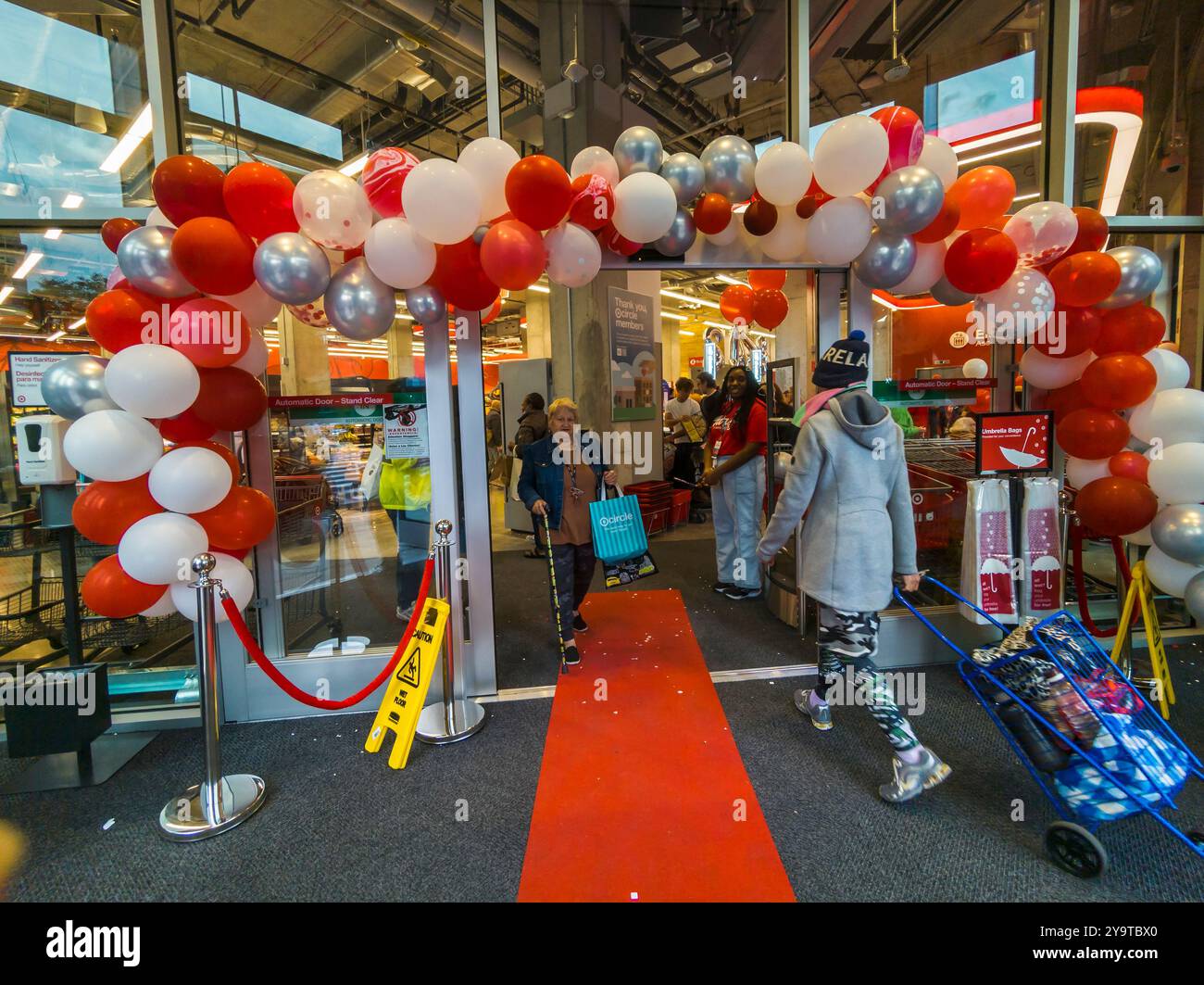 Hordes of excited shoppers flock to the grand opening of a new Target ...