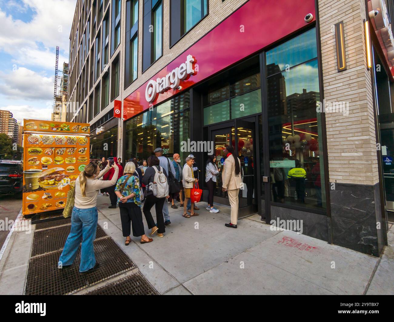 Hordes of excited shoppers flock to the grand opening of a new Target ...