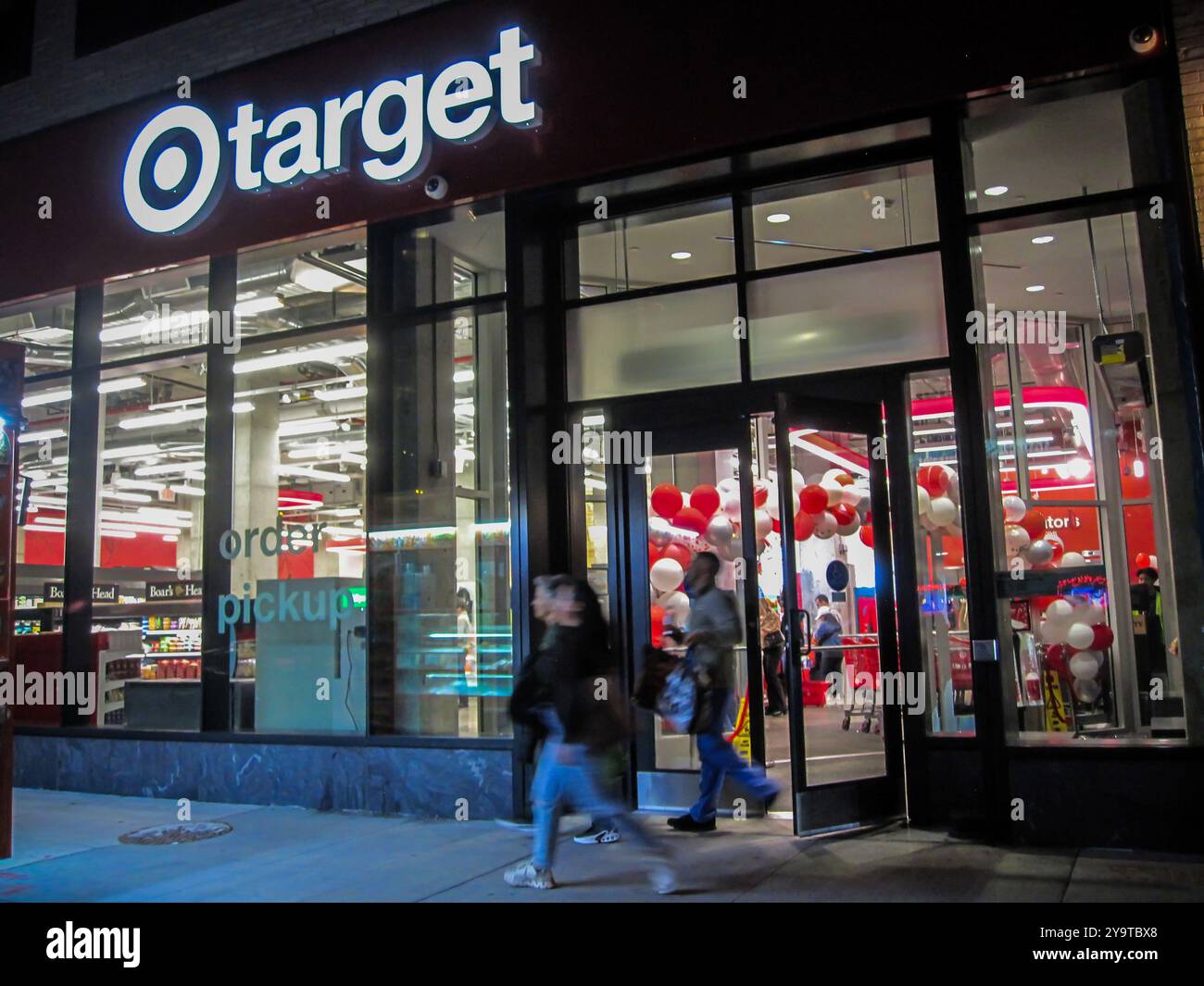Shoppers at the grand opening of a new Target store in Chelsea in New ...