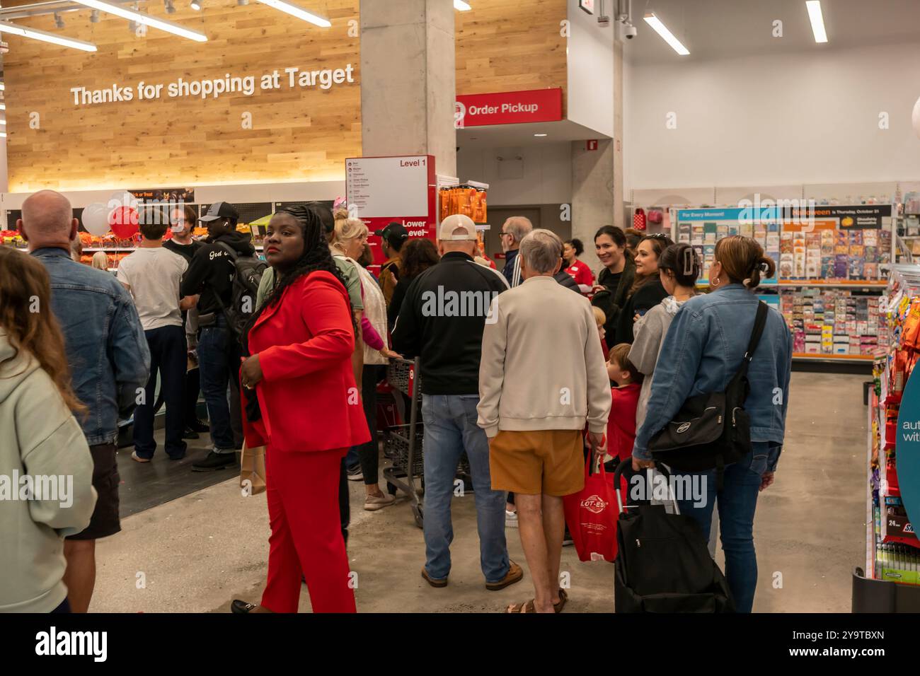 Hordes of excited shoppers flock to the grand opening of a new Target ...