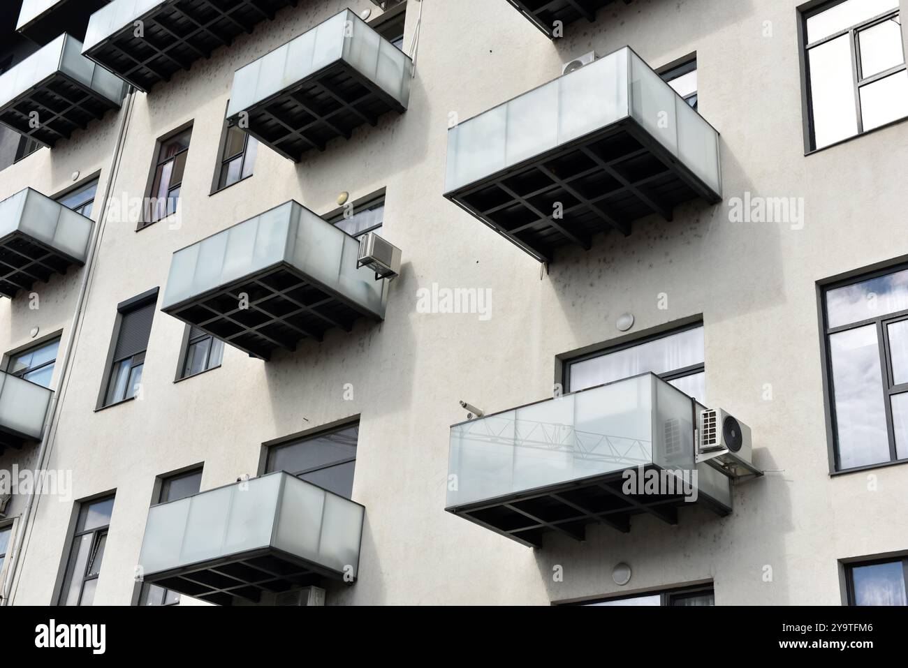 Modern balcony facade of apartment block Stock Photo - Alamy