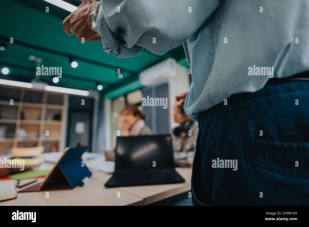 College students collaborating on a modern classroom project Stock Photo - Alamy