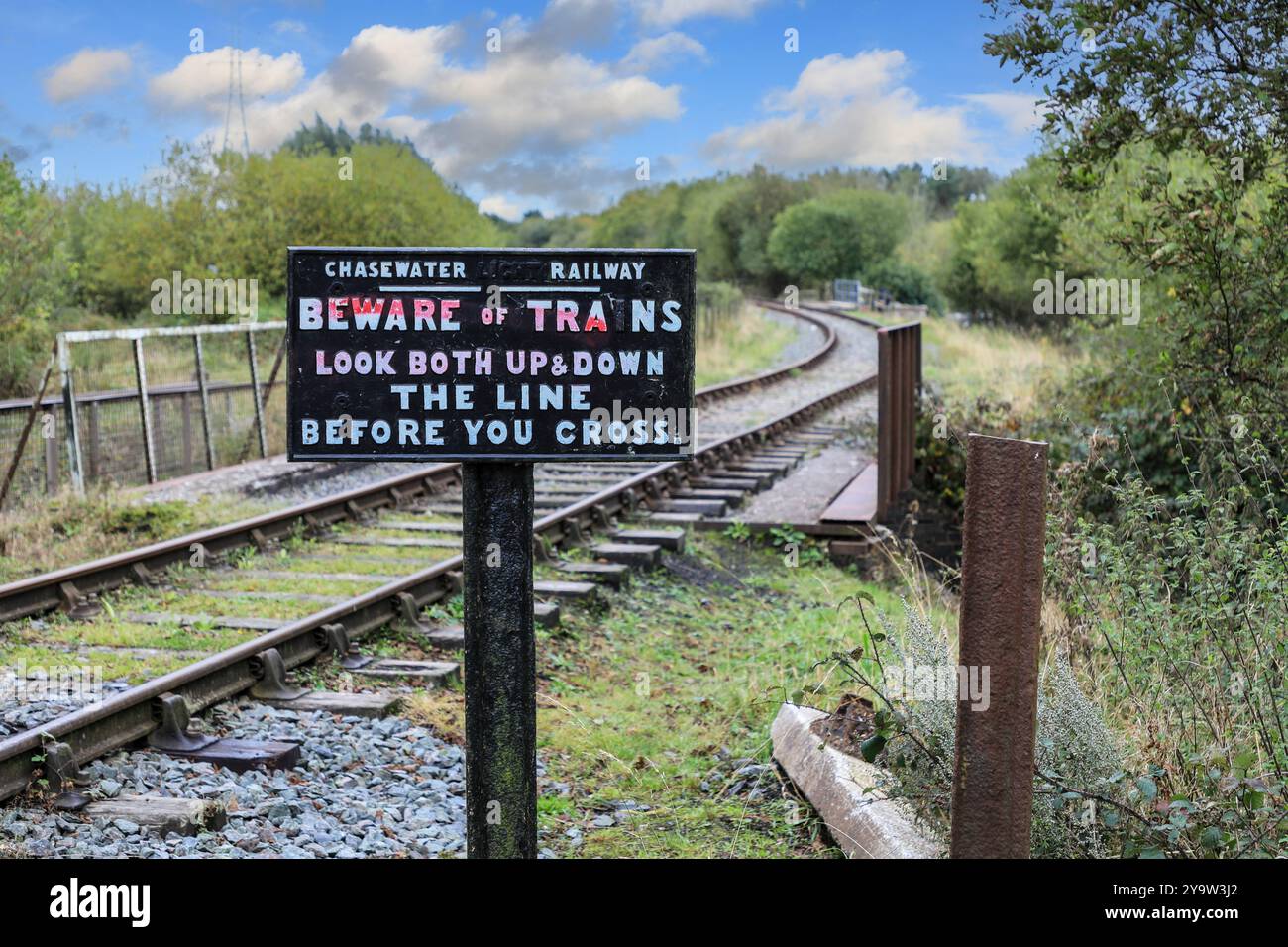 A sign saying "Beware of trains" on the Chasewater Railway at ...
