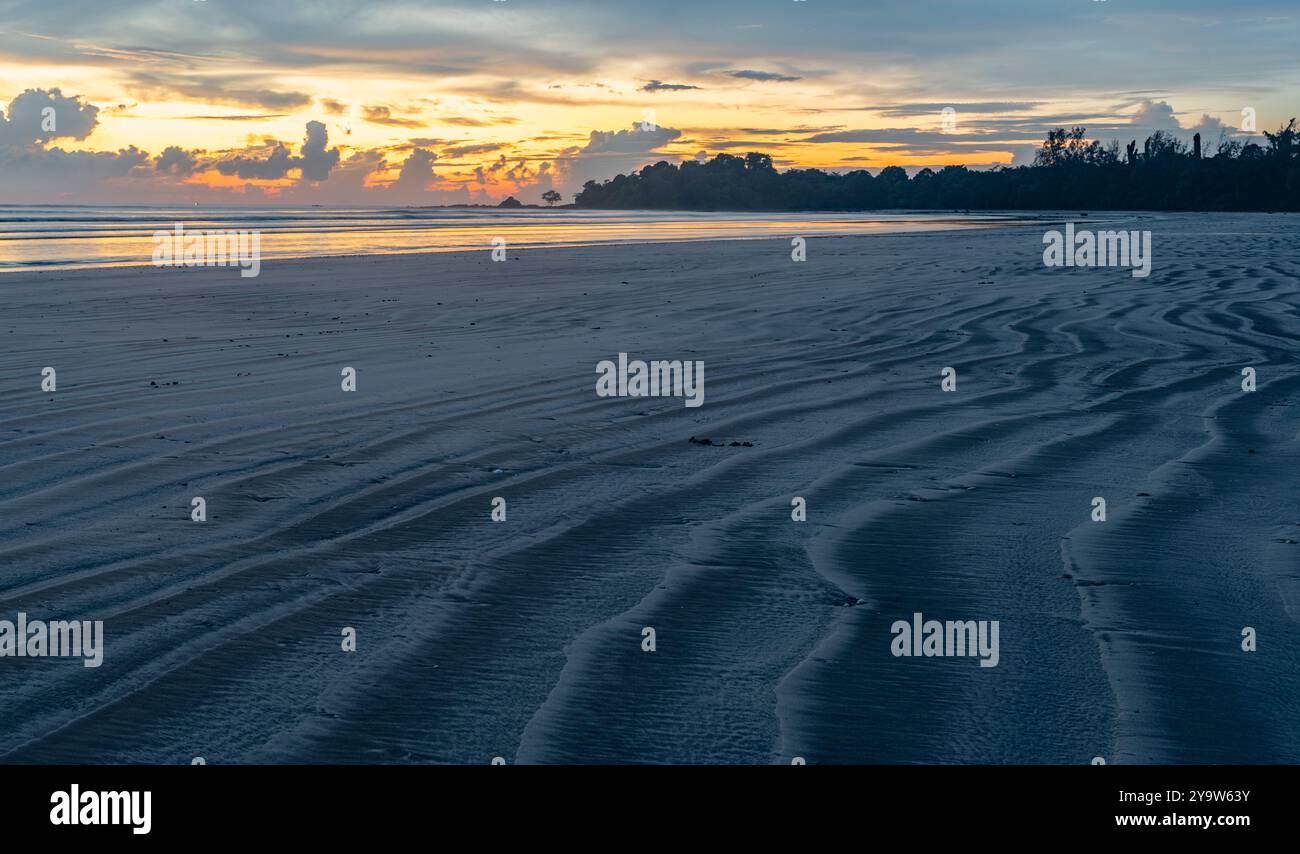 Desaru seaside at sunrise. The flat coast shows interesting patterns ...