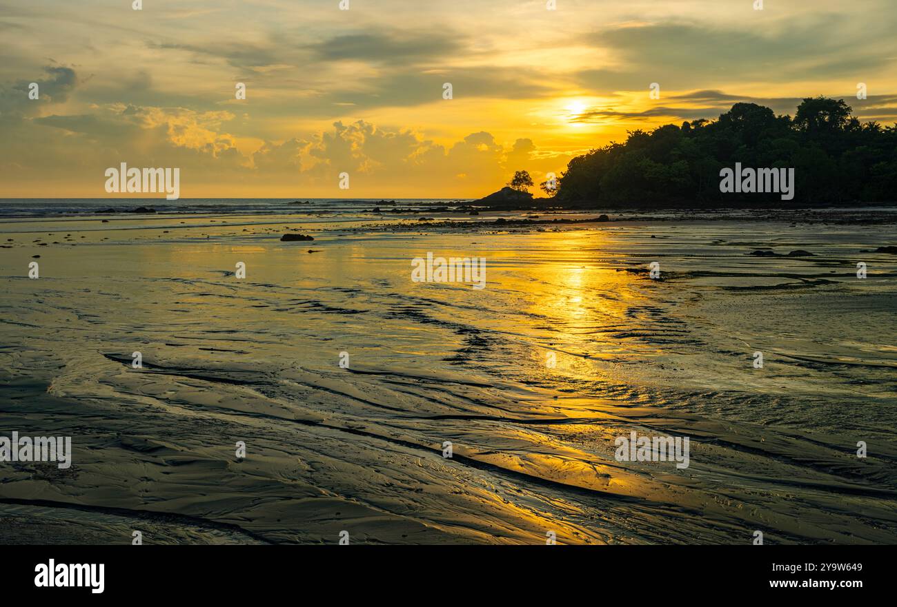 Desaru seaside at sunrise. The flat coast shows interesting patterns ...