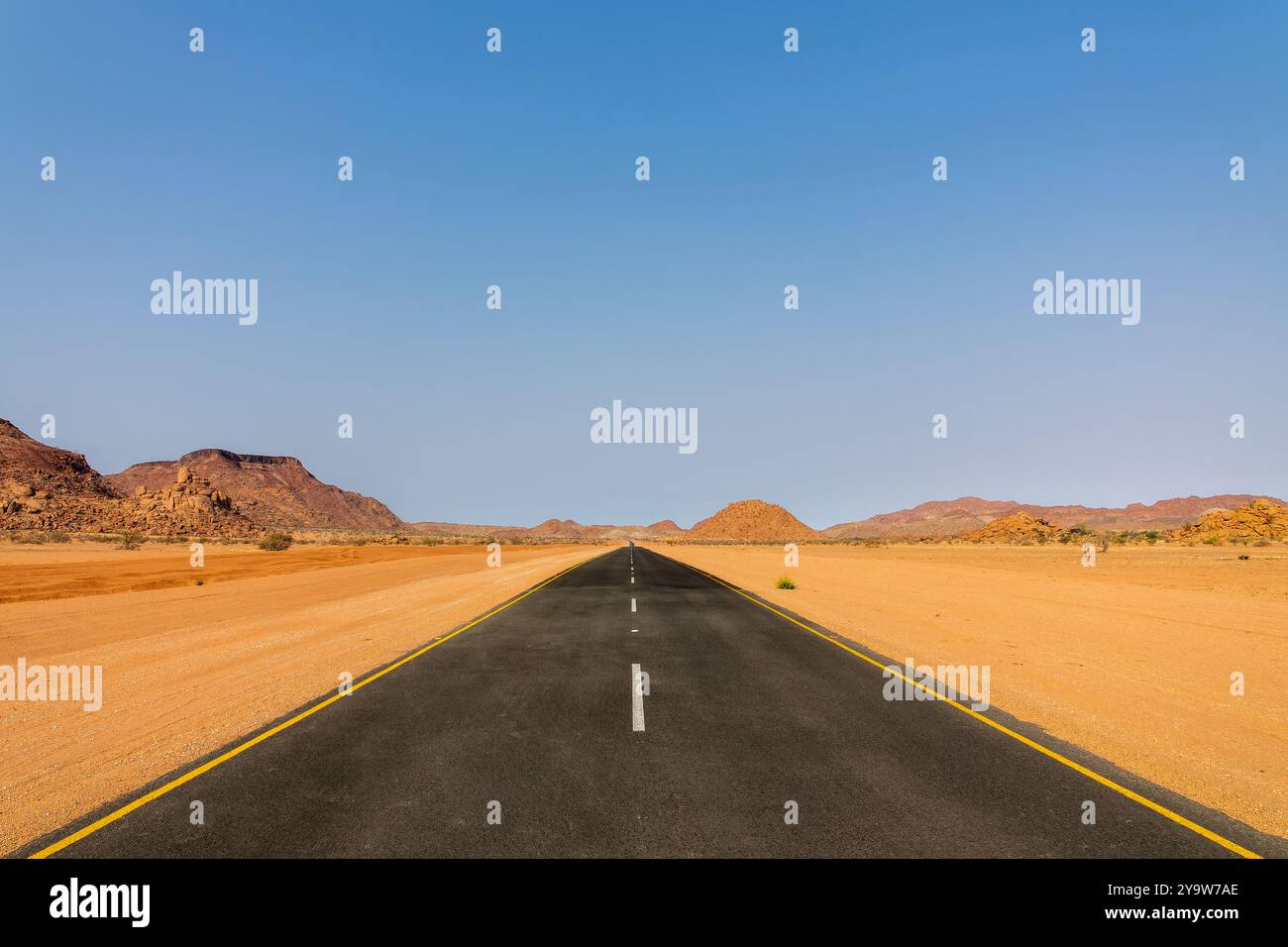 Driving on a new modern asphalt road in Damaraland, road perspective in ...