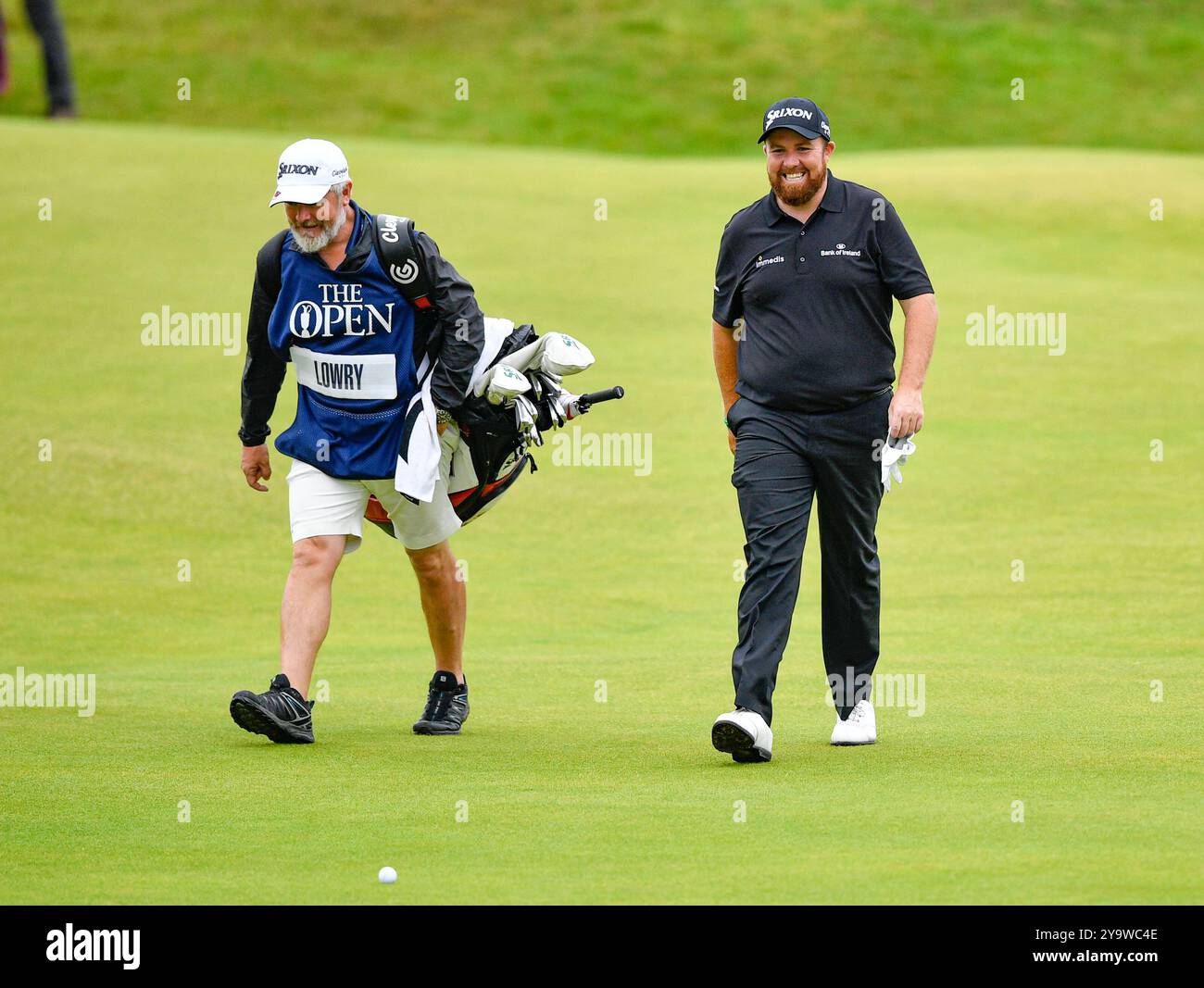 Jul 19, 2019, Shane Lowry and caddy Brian “Bo” Martin walk up the 18th ...