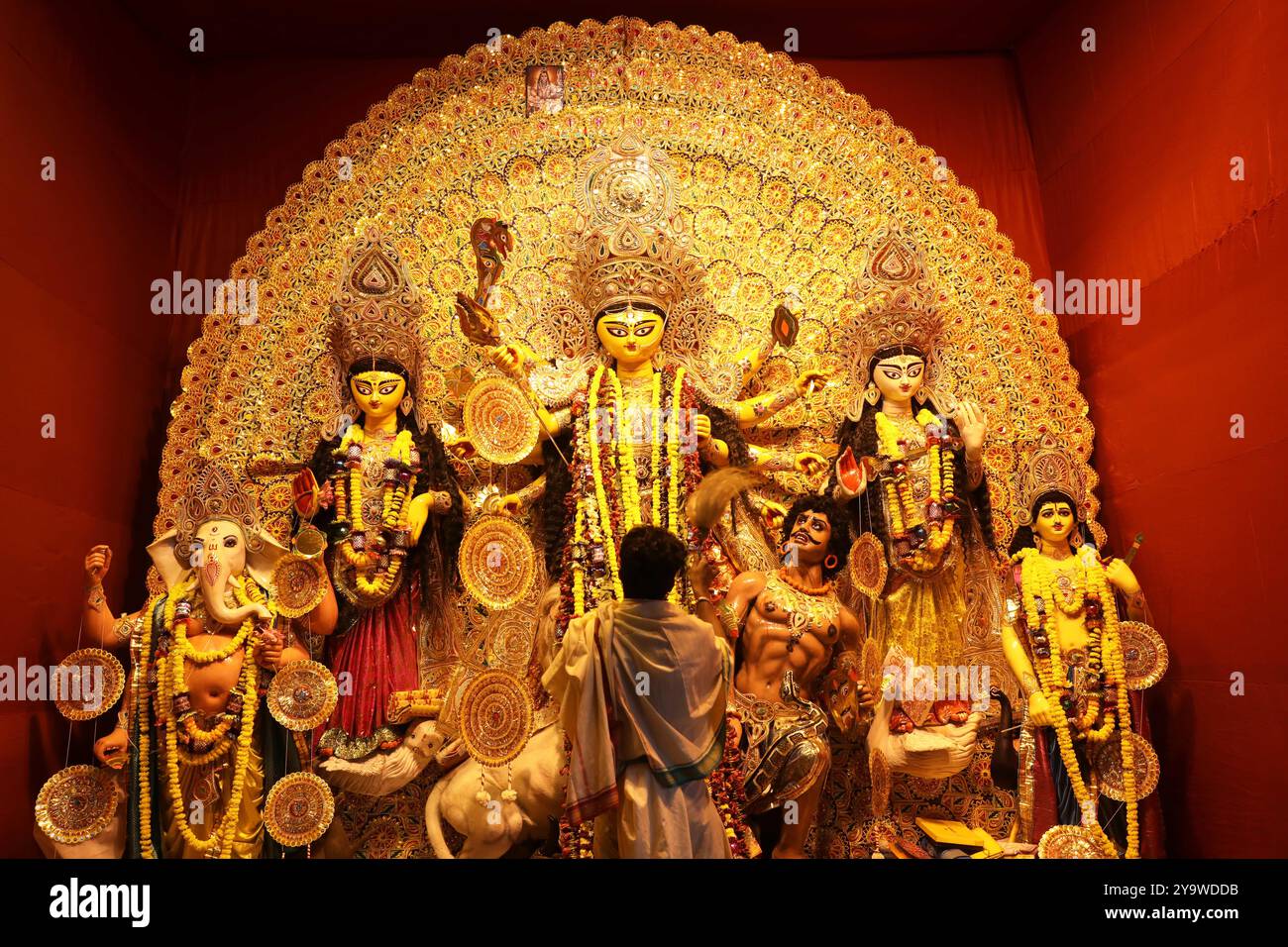 October 11, 2024, Kolkata, West Bengal, India: A Hindu priest holds a ...