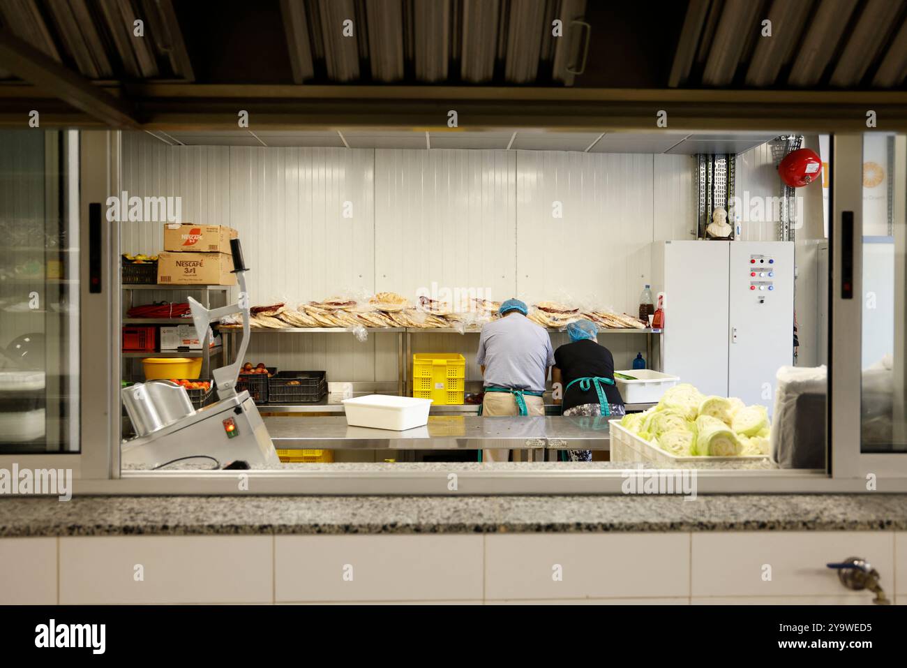 Lebanon. 11th Oct, 2024. People gather to prepare meals for immigrants ...