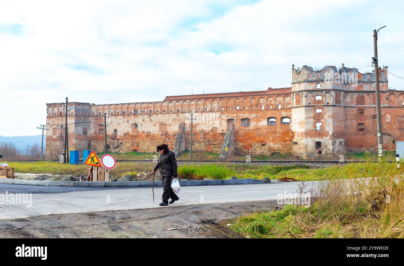 The old ruins of the collapsed walls with gates and windows ...