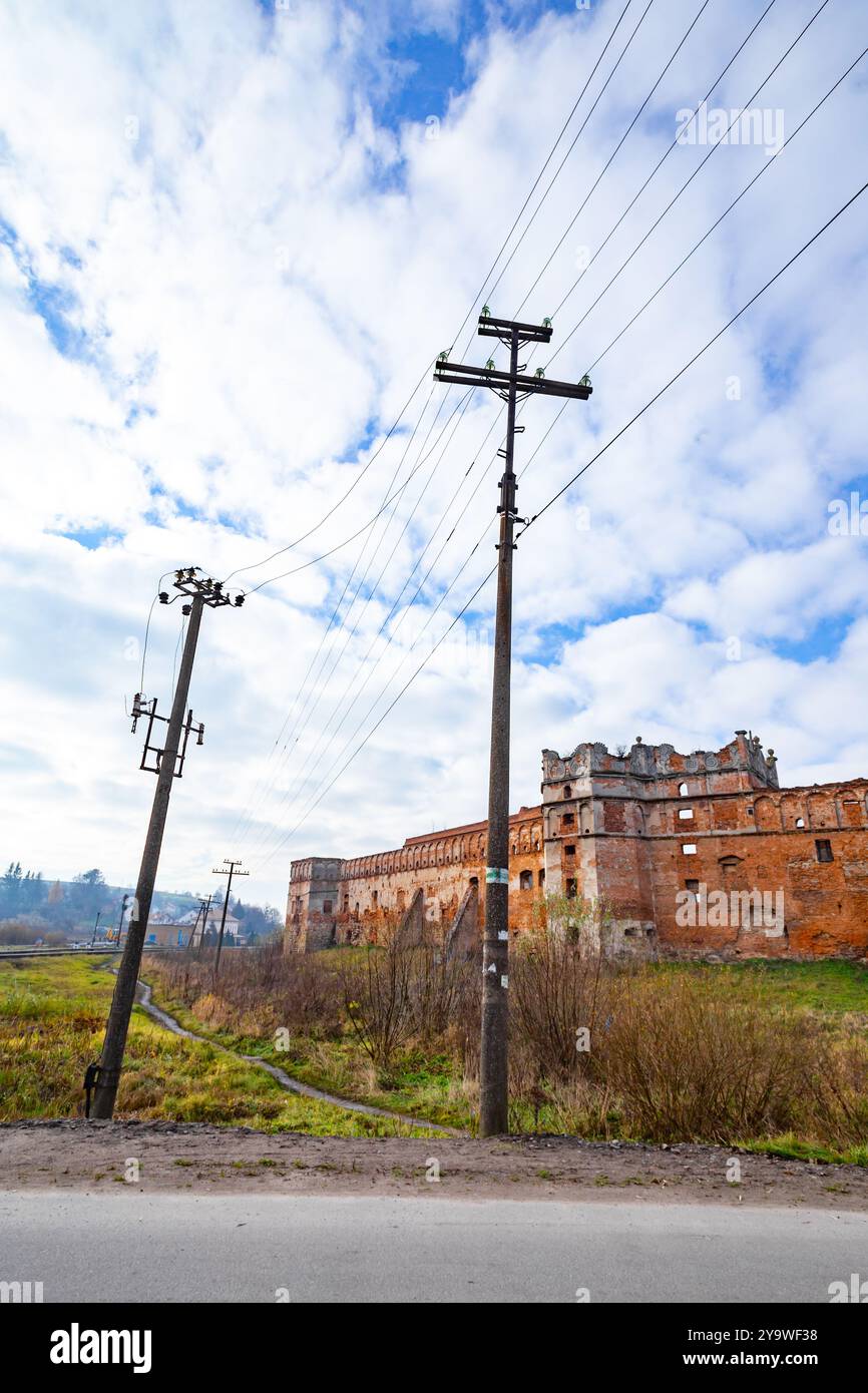 The old ruins of the collapsed walls with gates and windows ...