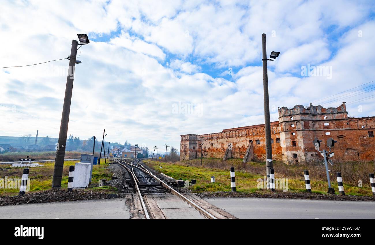 The old ruins of the collapsed walls with gates and windows ...