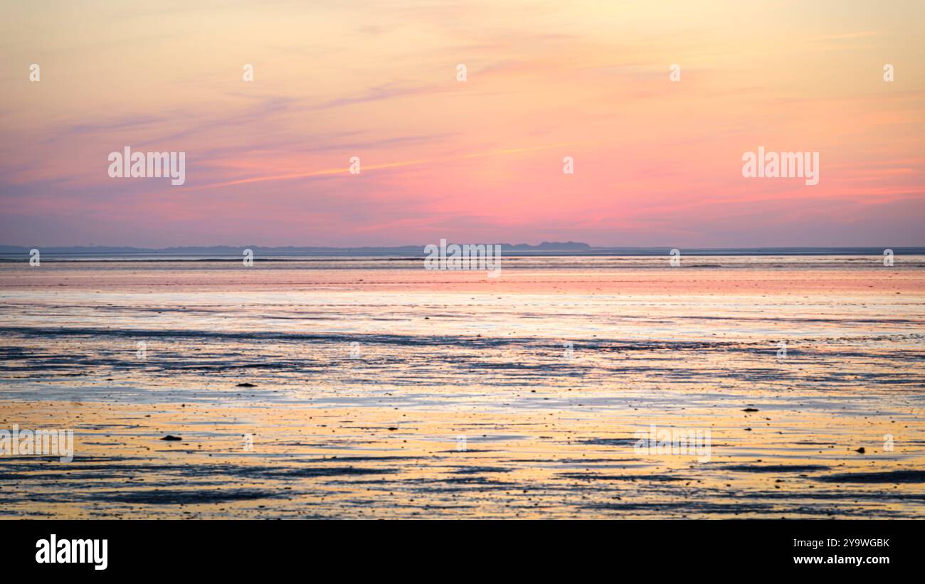 Sundown landscape at beautiful mudplanes of the Wadden sea UNESCO ...