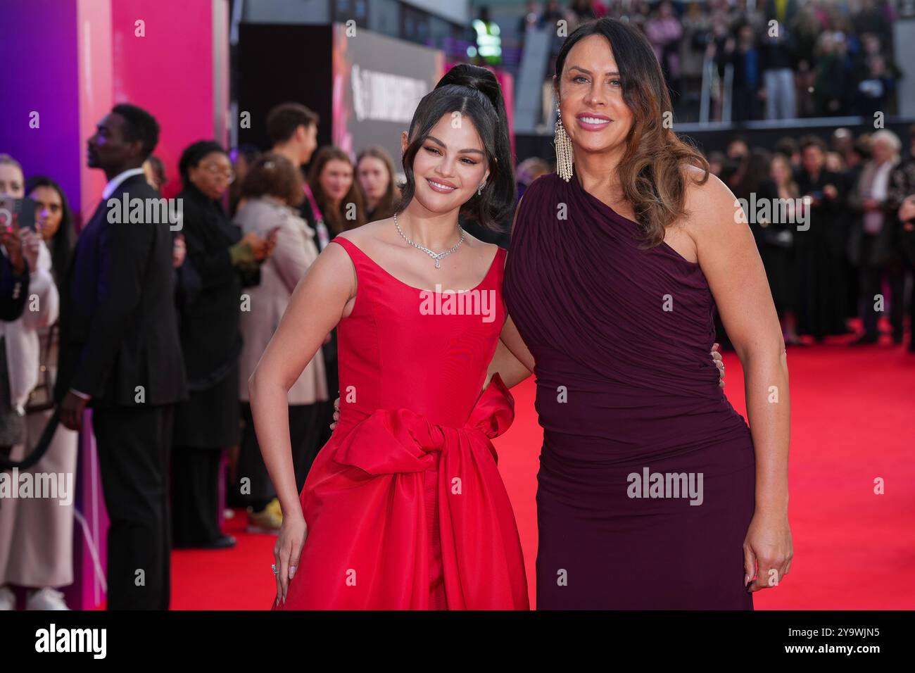 Selena Gomez, left, and Karla Sofía Gascon pose for photographers upon arrival at the premiere ...