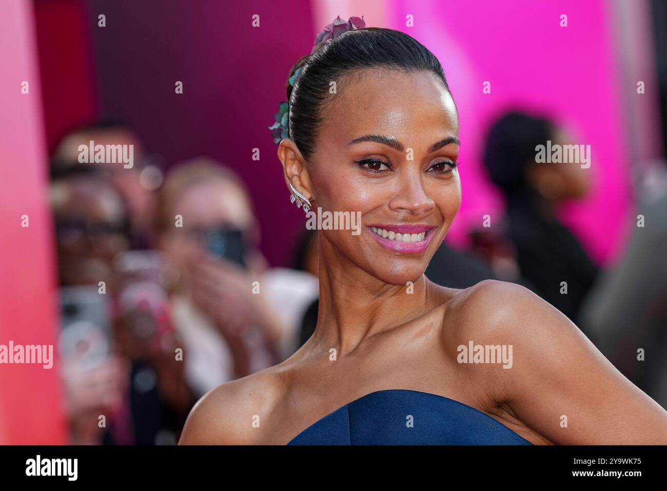 Zoe Saldana poses for photographers upon arrival at the premiere of the ...