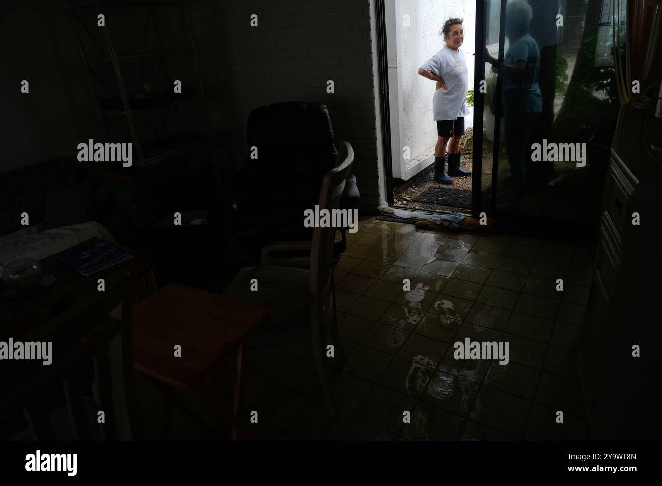 Residents assess Hurricane Milton damage to their homes, which saw ...