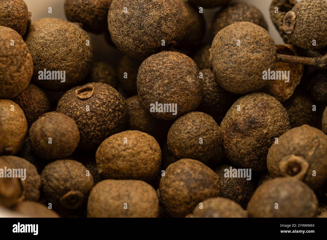 allspice close-up. pile of whole allspice, texture , macro Stock Photo ...