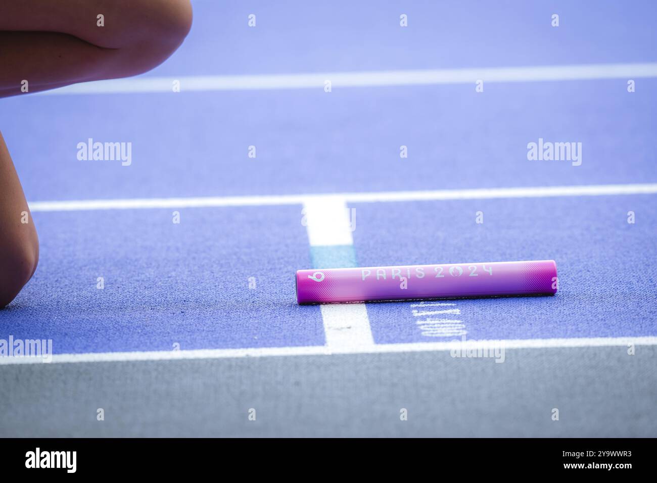 Relay stick at the Paris 2024 Olympic Games Stock Photo - Alamy