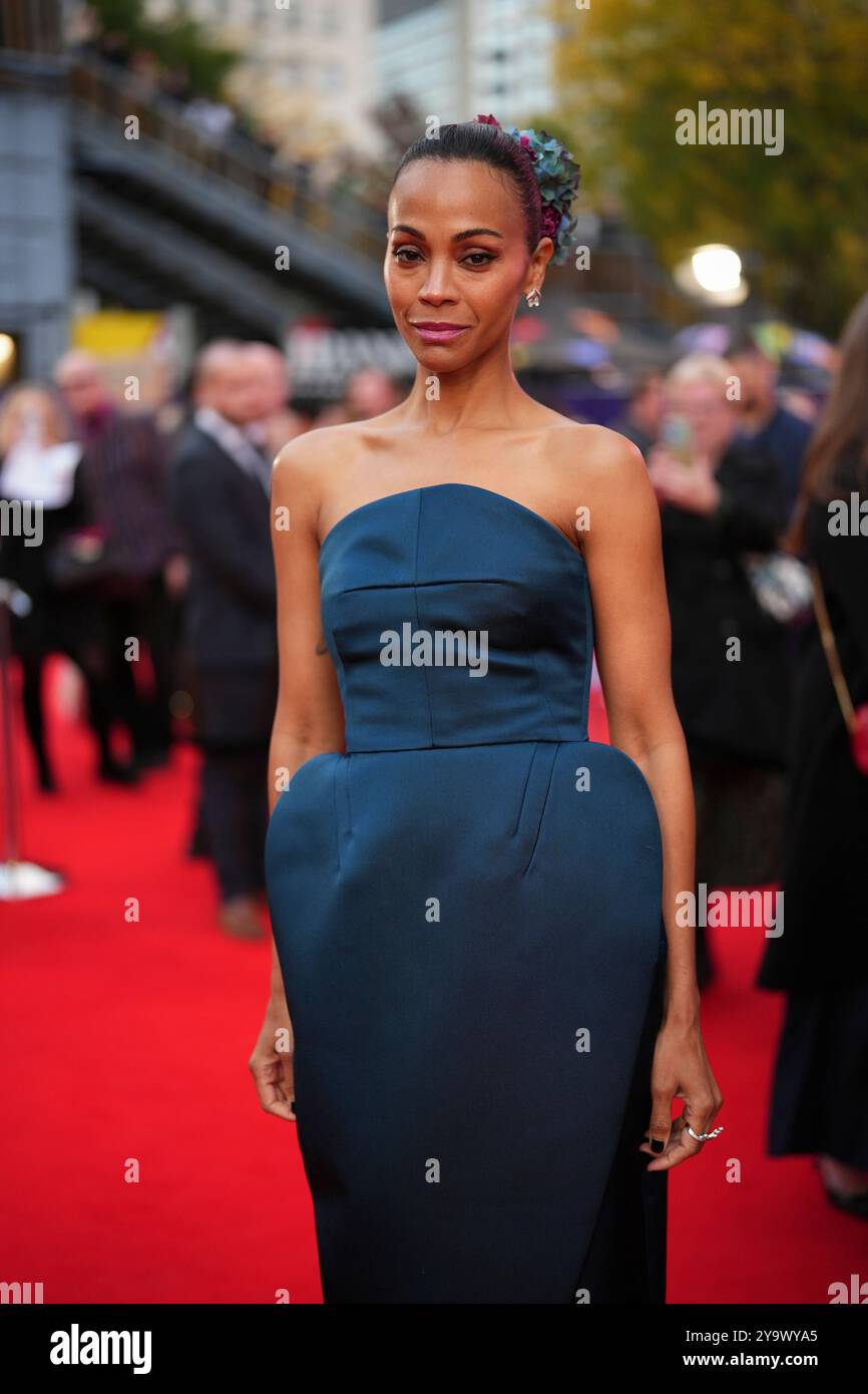 Zoe Saldana poses for photographers upon arrival at the premiere of the ...