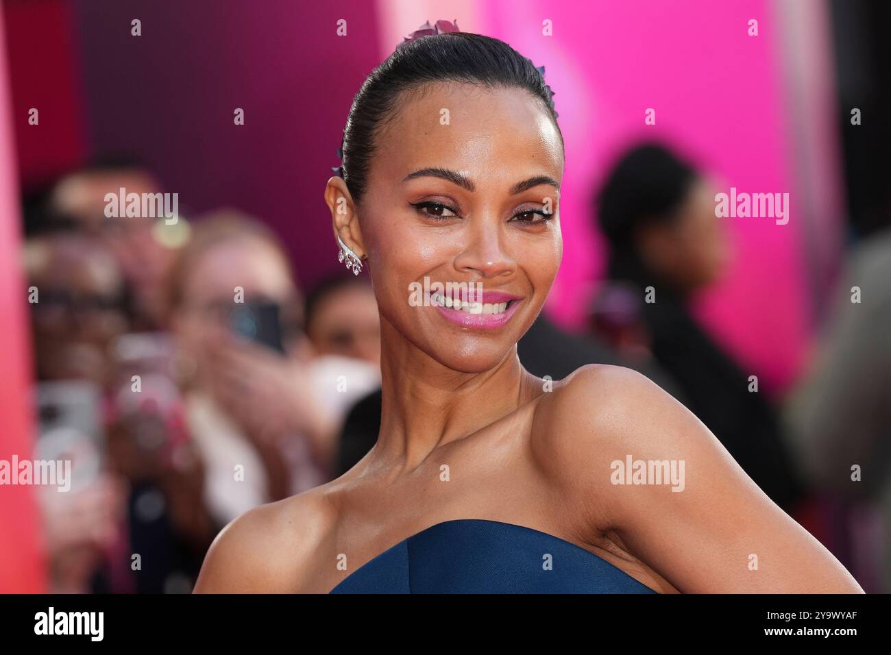 Zoe Saldana poses for photographers upon arrival at the premiere of the ...