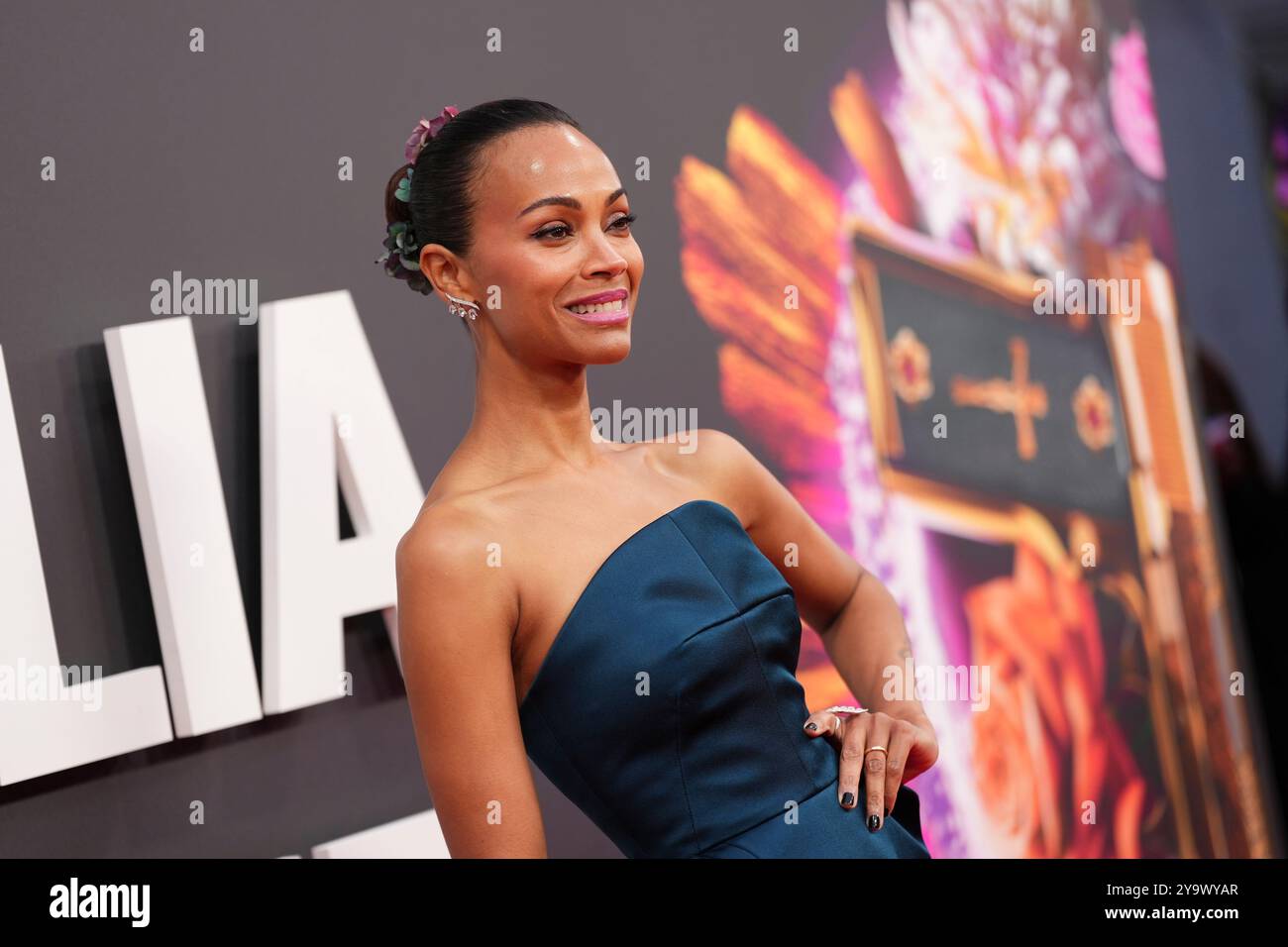 Zoe Saldana poses for photographers upon arrival at the premiere of the ...