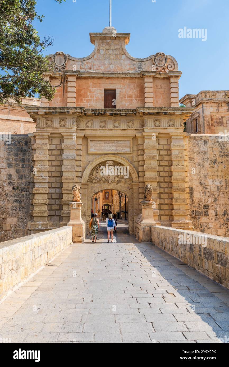 MDINA, MALTA - SEPTEMBER 02, 2024: Visitors enter Mdina through main ...