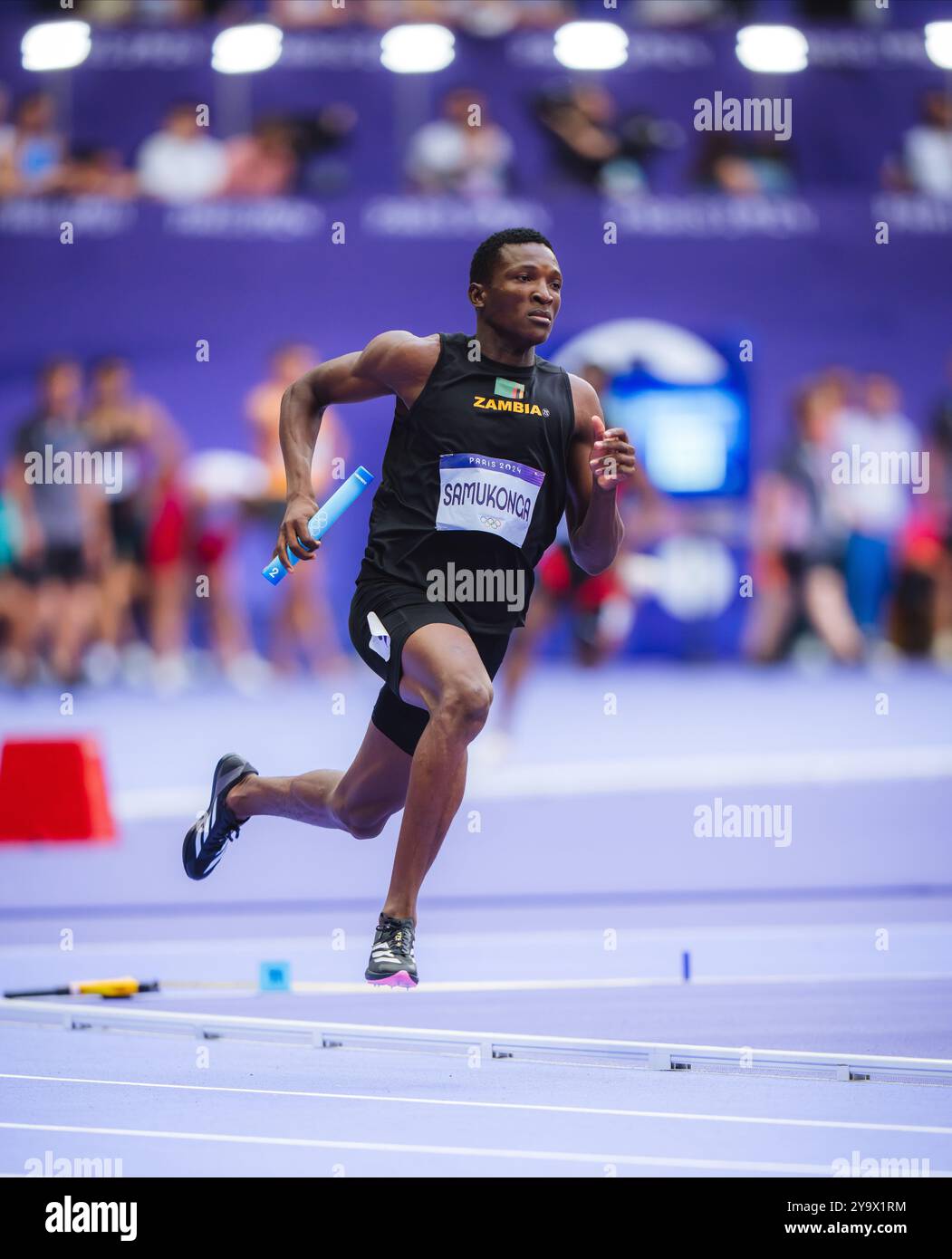 Muzala Samukonga participating in the 4X400 meters relay at the Paris ...