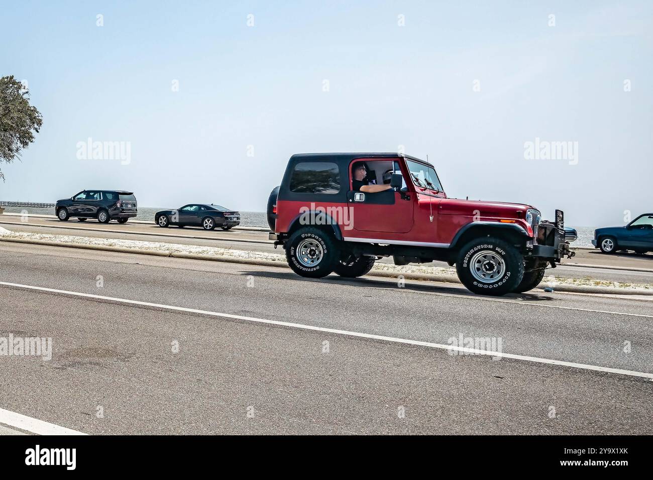 Gulfport, MS - October 04, 2023: Wide angle side view of a 1983 Jeep ...