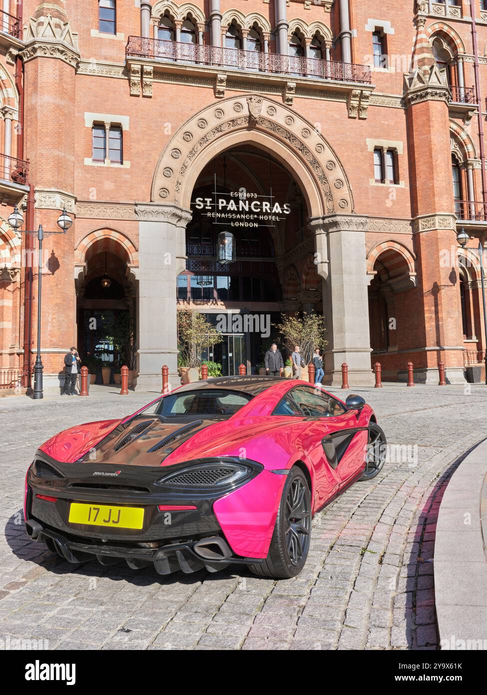 A McLaren sports car parked outside the St Pancras Renaissance hotel ...
