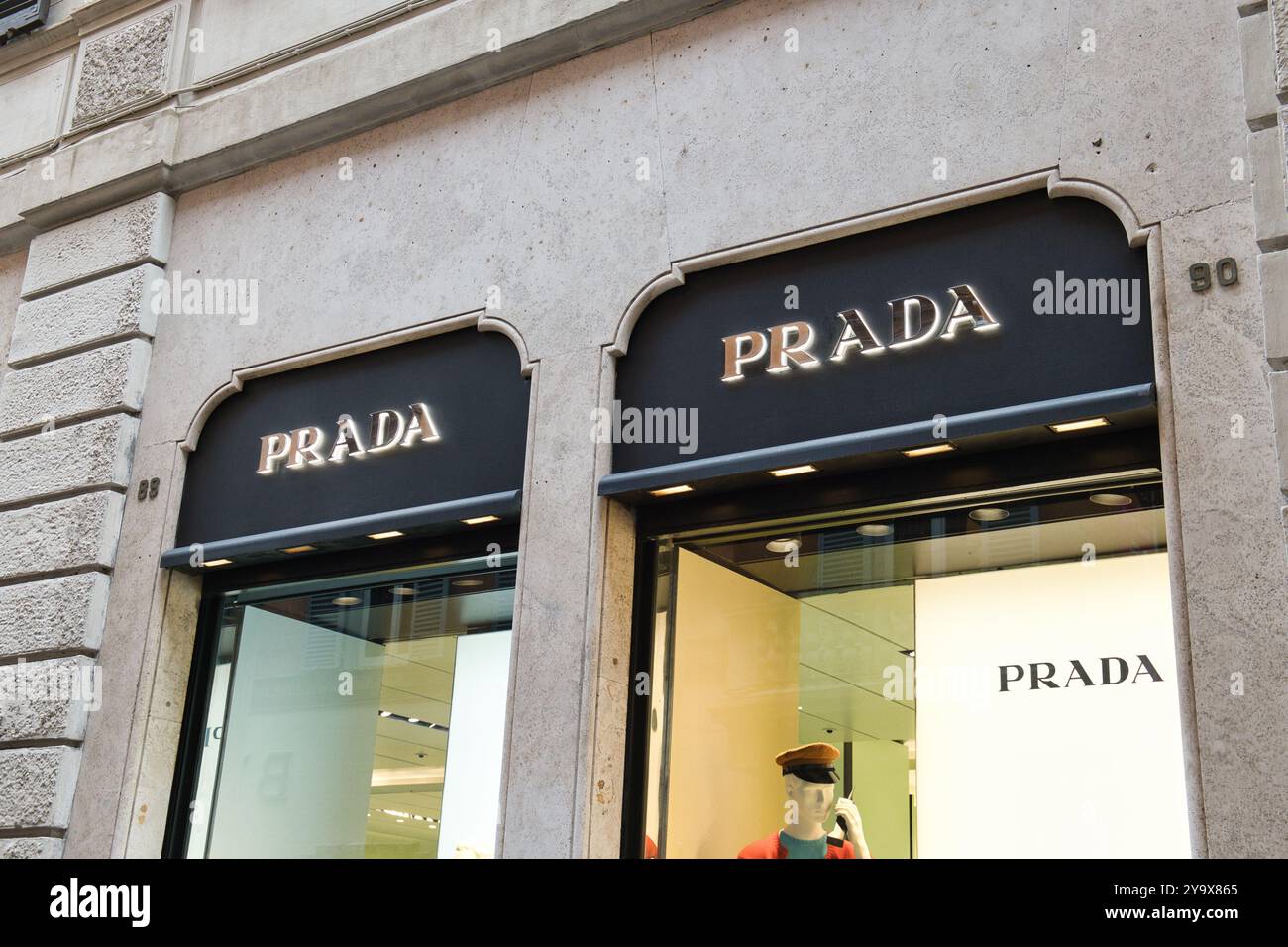 Prada logo brand on the window of a store in Rome , Italy Stock Photo ...