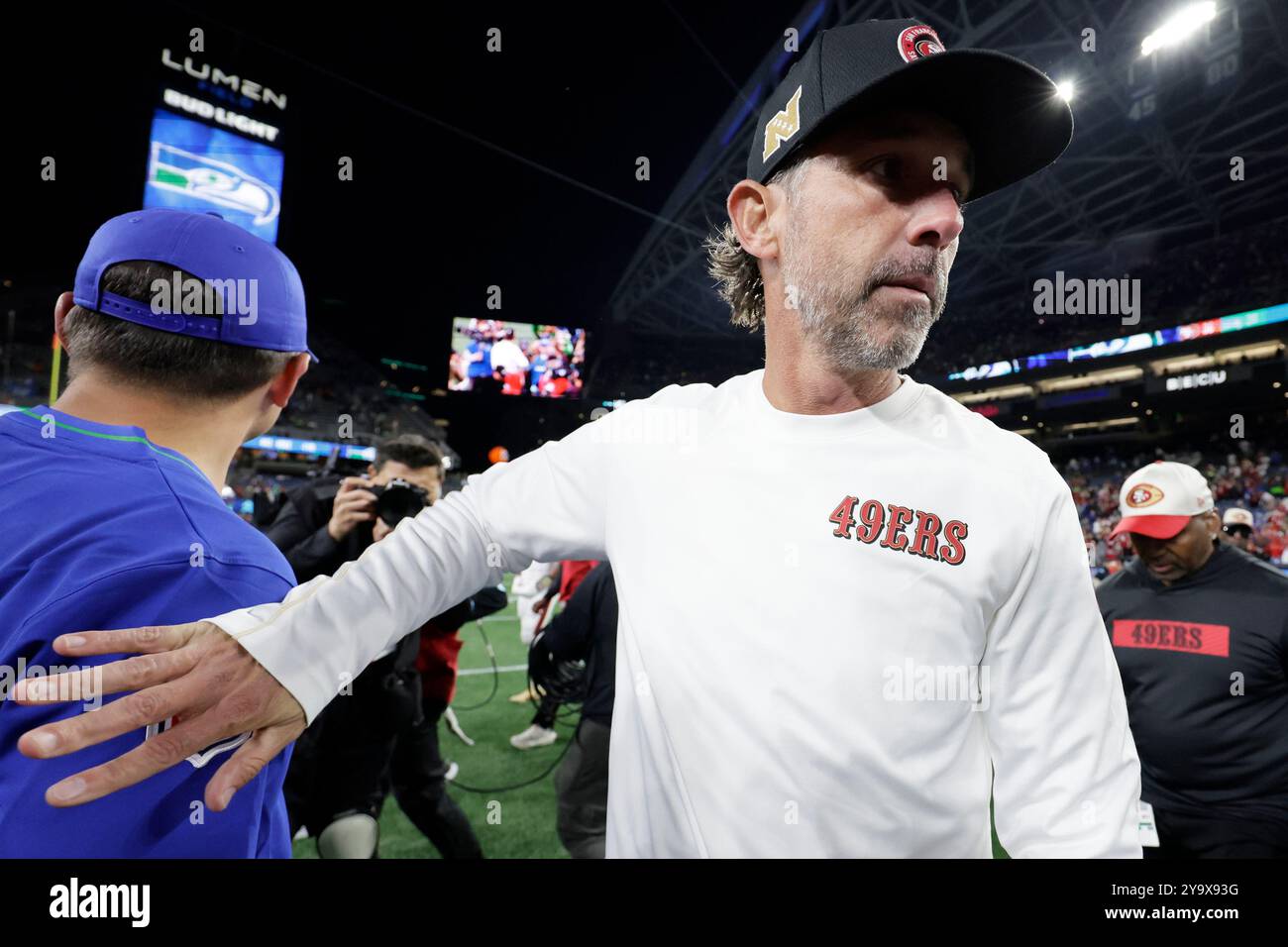 San Francisco 49ers head coach Kyle Shanahan pats Seattle Seahawks head ...