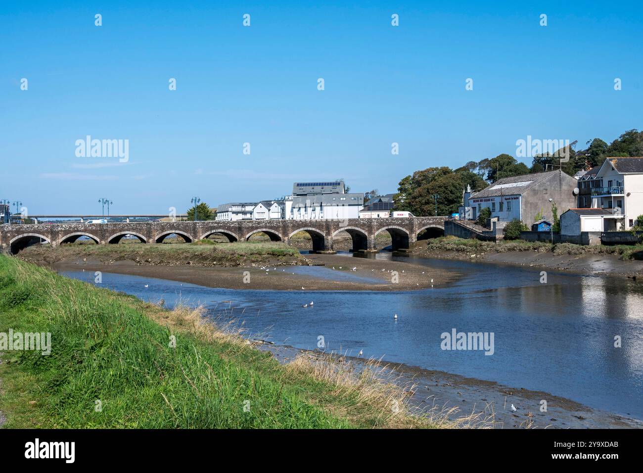 Wadebridge, a pretty town in Cornwall, England bridges over the river to connect both sides ...