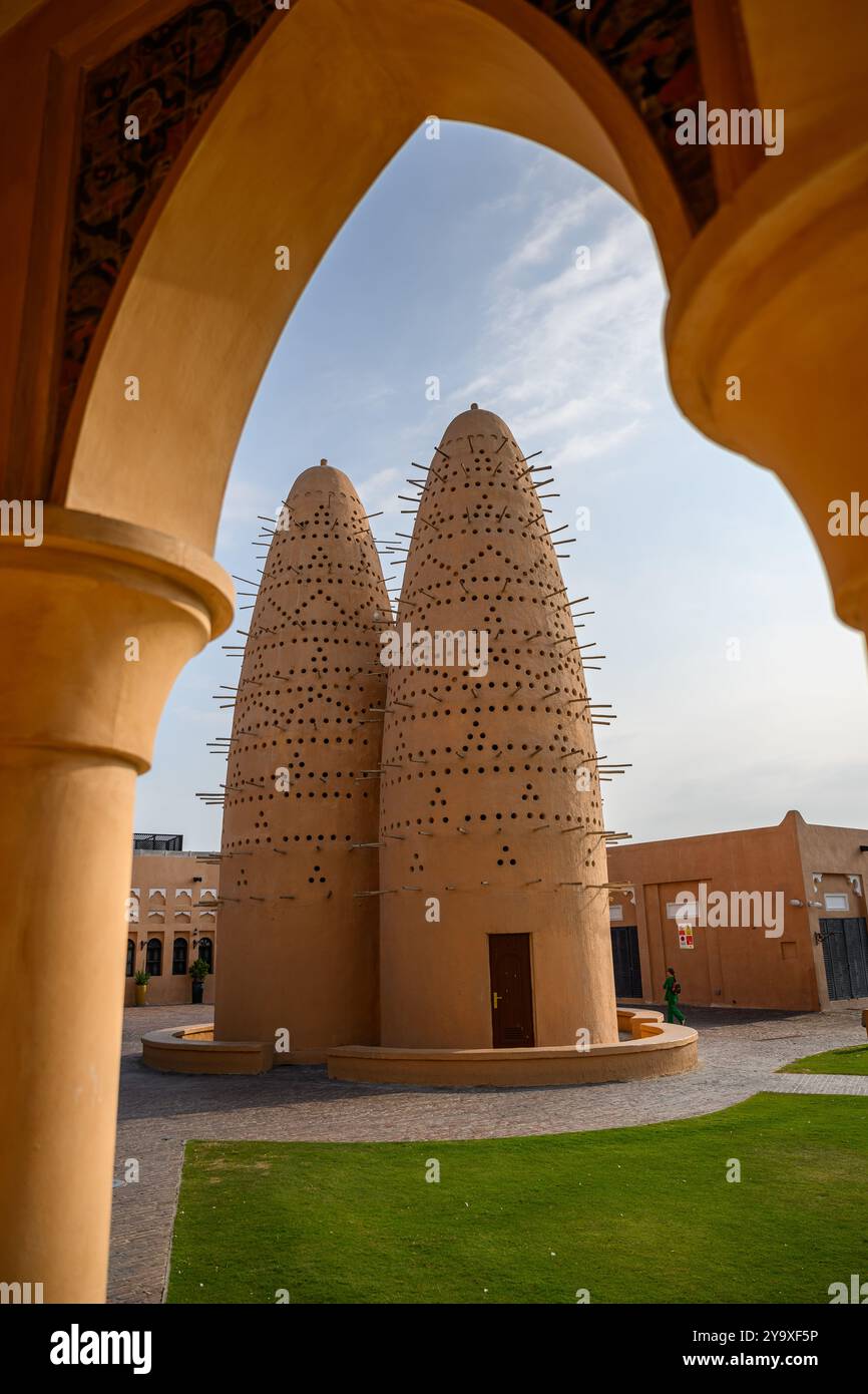 Pigeon towers of the Katara cultural village in Doha, Qatar framed ...