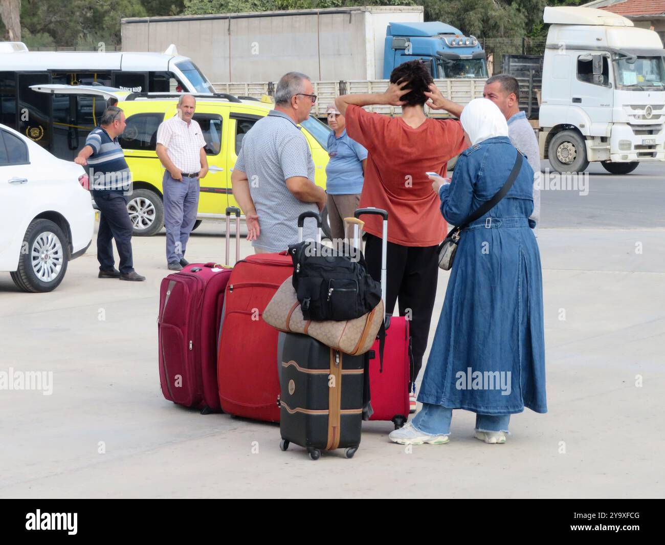 Lebanese displaced families arrive at the port of Ta?ucu, Turkey ...