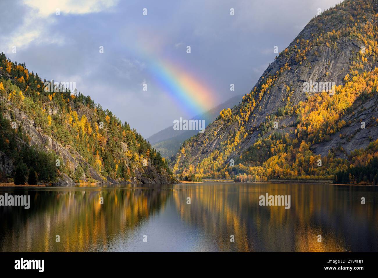Rainbow and Fall foliage at the lake Flaani (Nomedal, Agder), southern ...