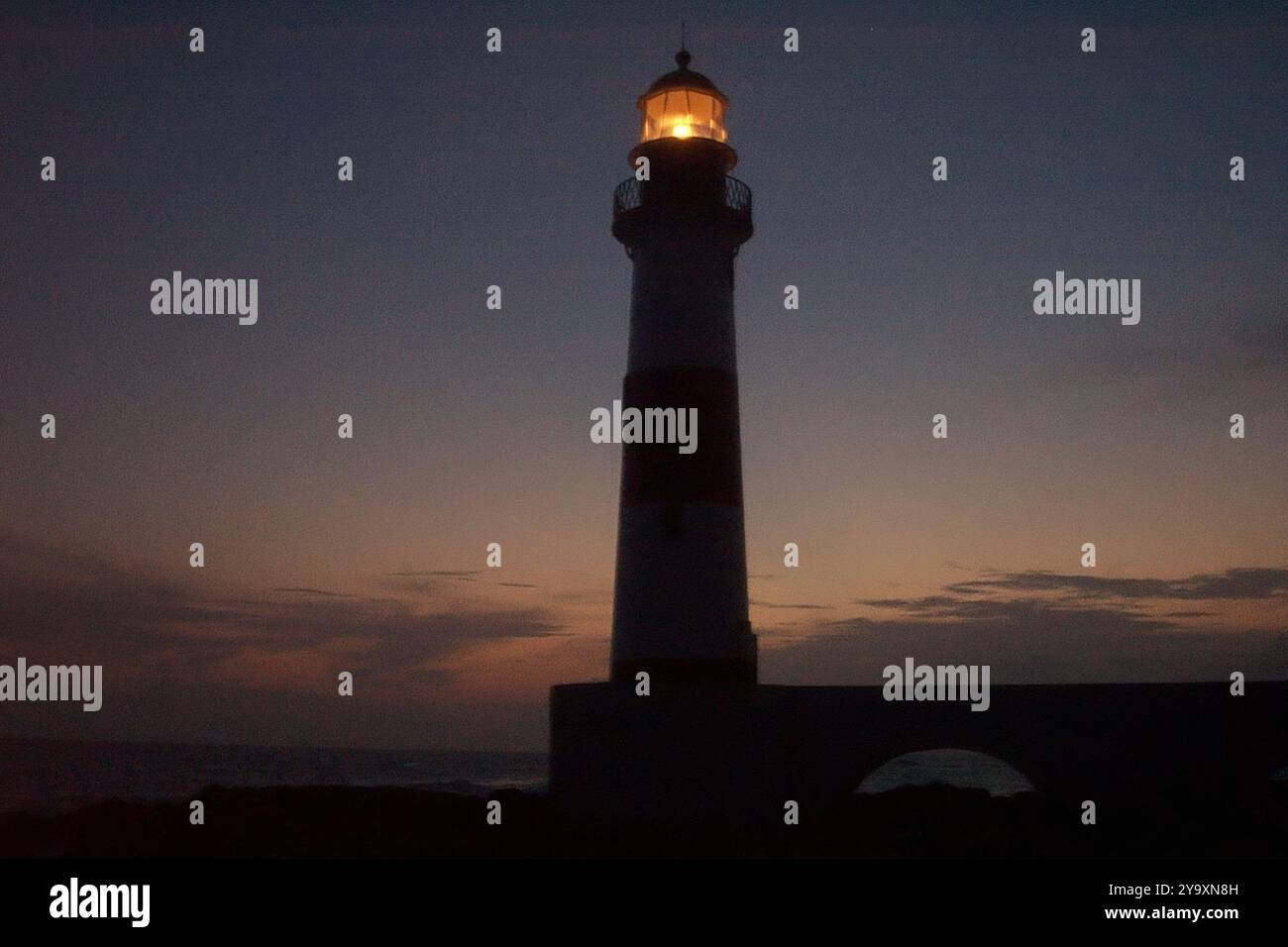 The famous Tapua Lighthouse in Bahia, Brazil, at sunset Stock Photo - Alamy