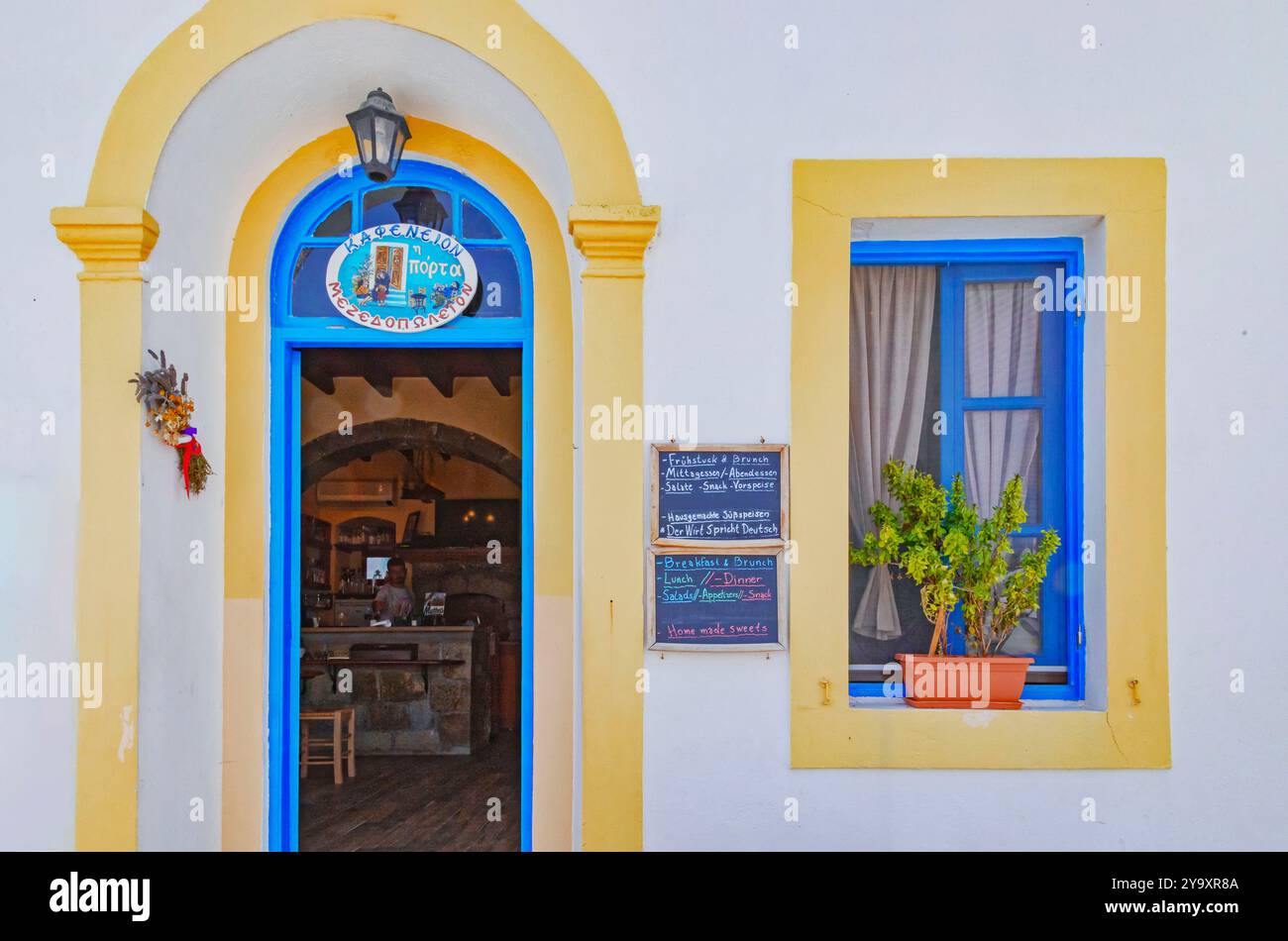 Greece, Dodecanese Islands, Facade of a Greek tavern, Nikia, Nisyros ...